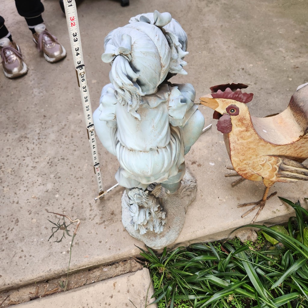 y157- plastic boy/girl statue - Leftover Treasures