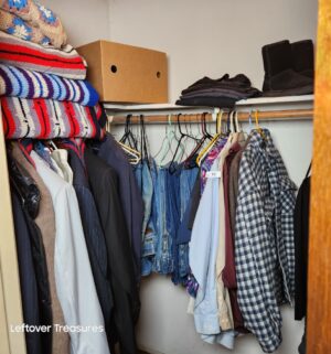 a12- Closet of mens clothing, knitted blankets. Very nice suits ...